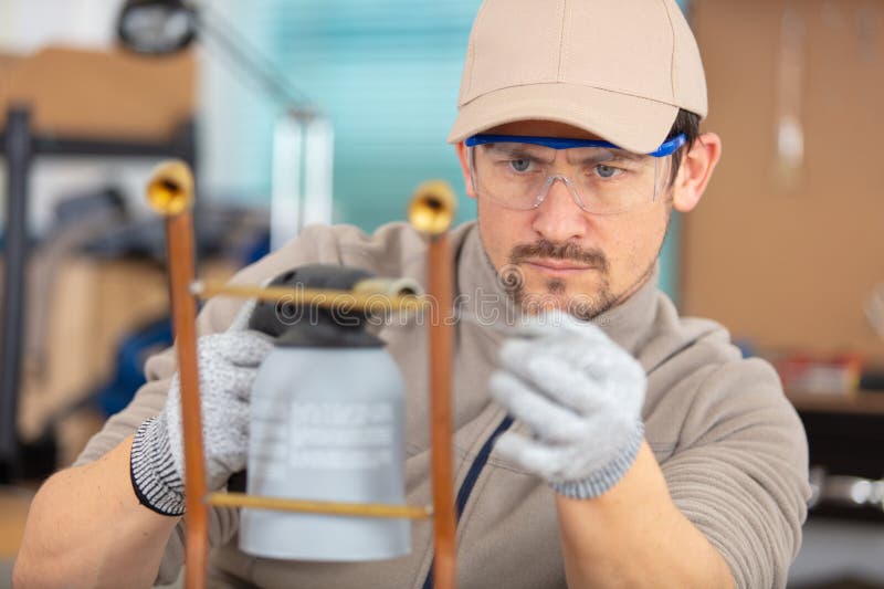 Plumber Cutting Pvc Pipe in House Construction Stock Image - Image of ...