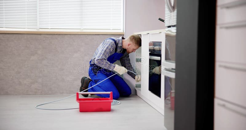 Plumber Drain Cleaning Services in Kitchen Stock Image - Image of tool ...