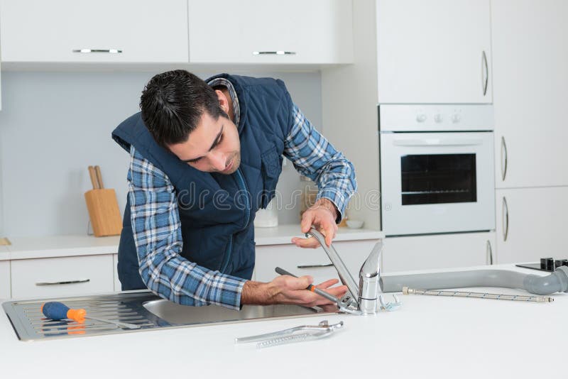 Plumber Fitting Kitchen Tap Stock Image - Image of adjustment, waste ...