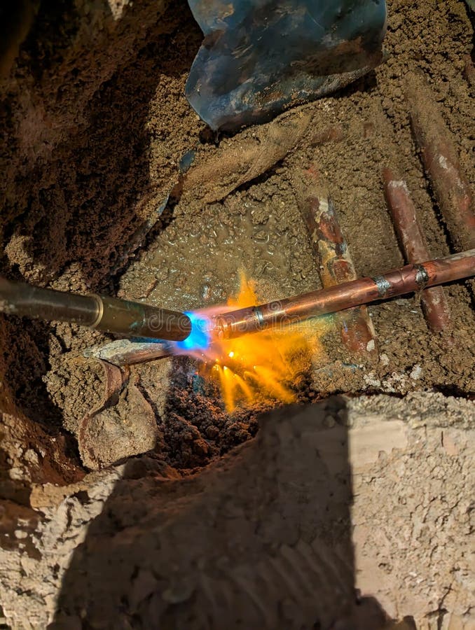 Plumber Fixing a Copper Pipe Water Leak Stock Photo - Image of fixing ...