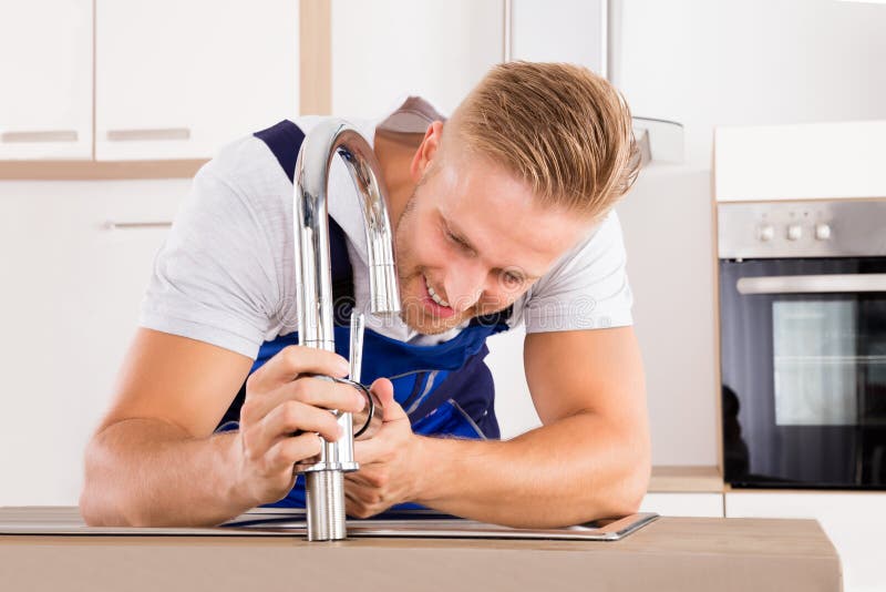 Plumber Fixing Faucet in Kitchen Stock Image - Image of plumbing ...