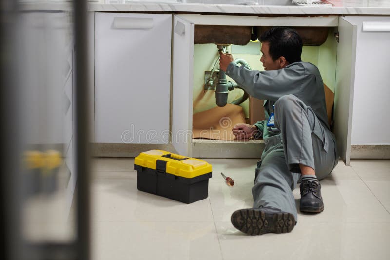 Plumber Fixing Leaking Sink Stock Photo - Image of problem, technology ... Plumber Fixing Leaking Sink Stock Photo - Image of problem, technology ...