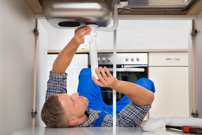 Plumber Fixing Pipe into the Sink Stock Photo - Image of maintenance ...