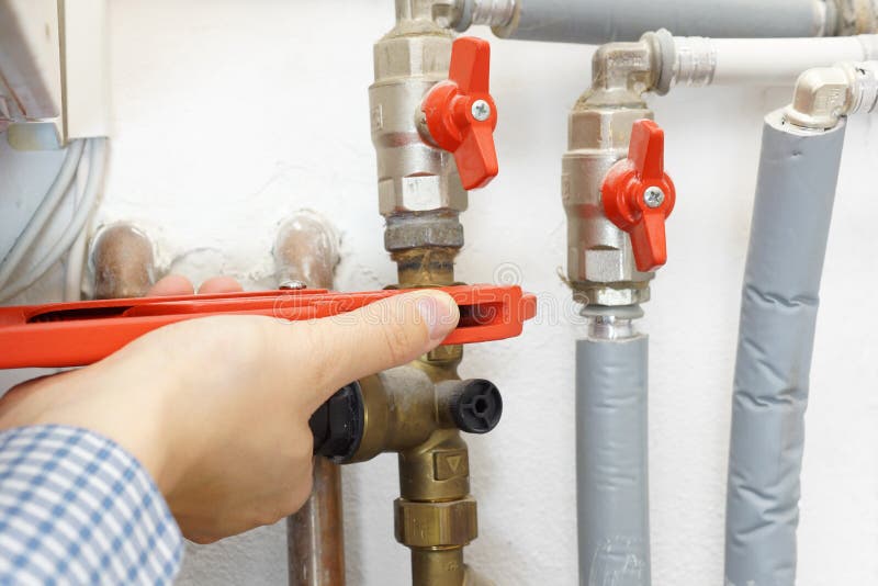 Plumber fixing pipe system stock image. Image of optimize - 41468965