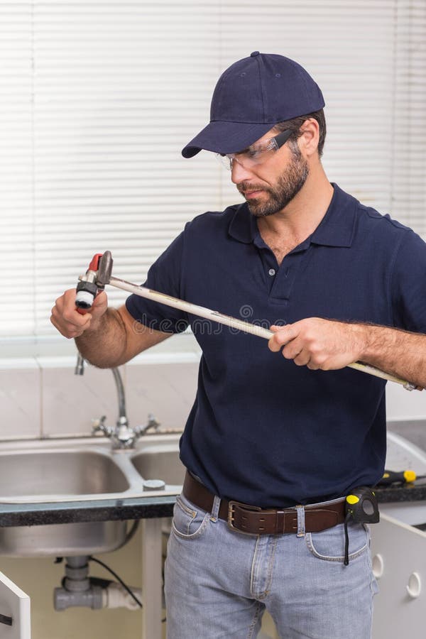 Plumber Fixing Pipe with Wrench Stock Photo - Image of profession ...