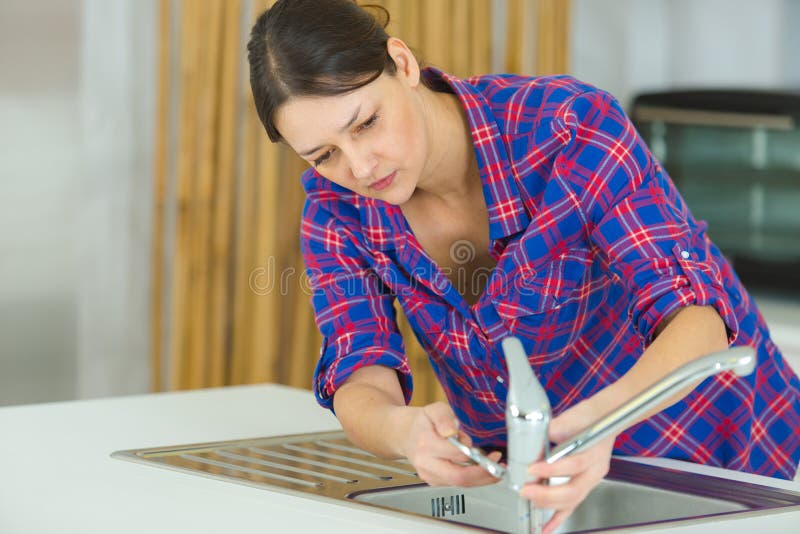 Plumber Fixing Tap with Adjustable Wrench Stock Photo - Image of expert ...