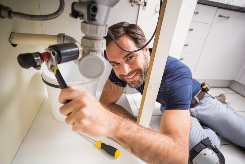 Plumber Fixing Under the Sink Stock Photo - Image of plumber, pipe ...