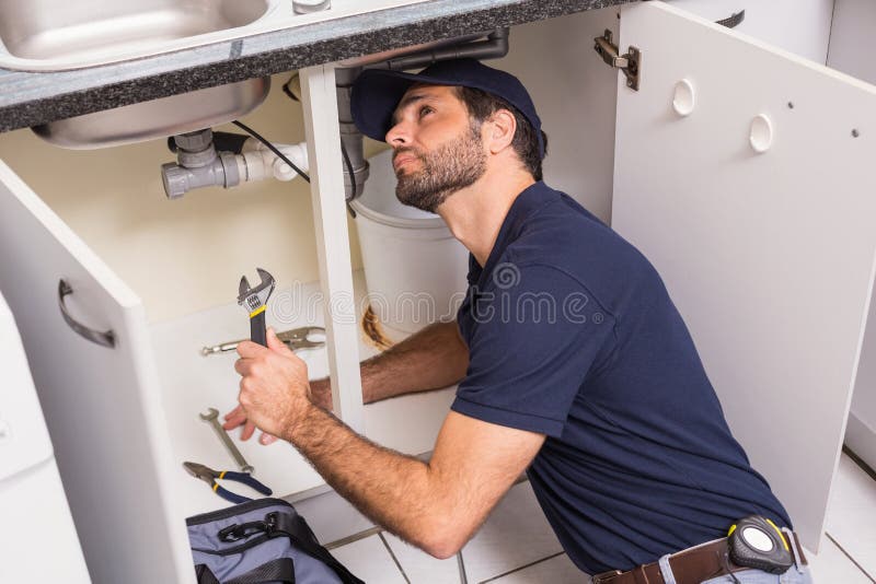 Plumber Fixing Under the Sink Stock Photo - Image of maintenance, tool ...