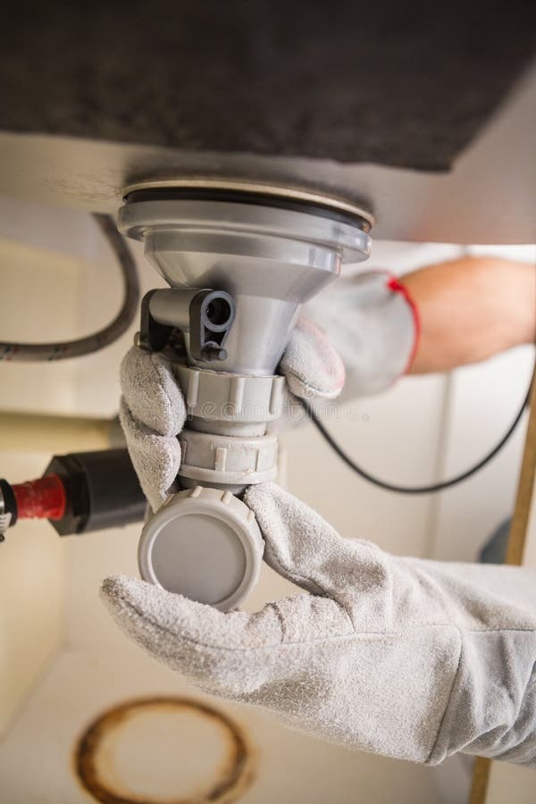 Plumber Fixing Under the Sink Stock Image - Image of repairing ...