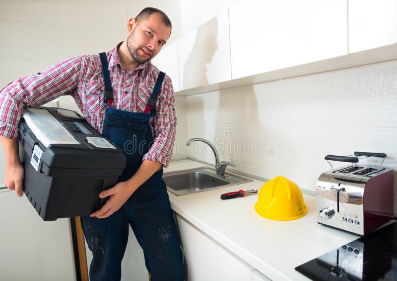 Handsome Man Standing in the Kitchen with His Toolbox Stock Photo ...