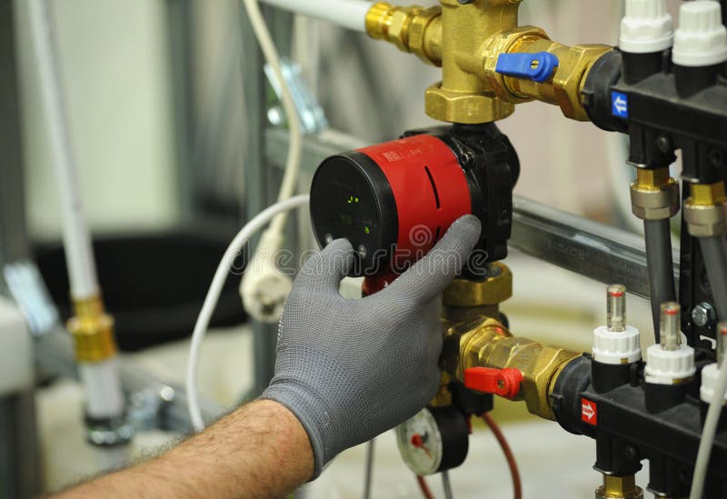 Plumber Hands Installing Circulation Pump for Heating System Stock ... Plumber Hands Installing Circulation Pump for Heating System Stock ...