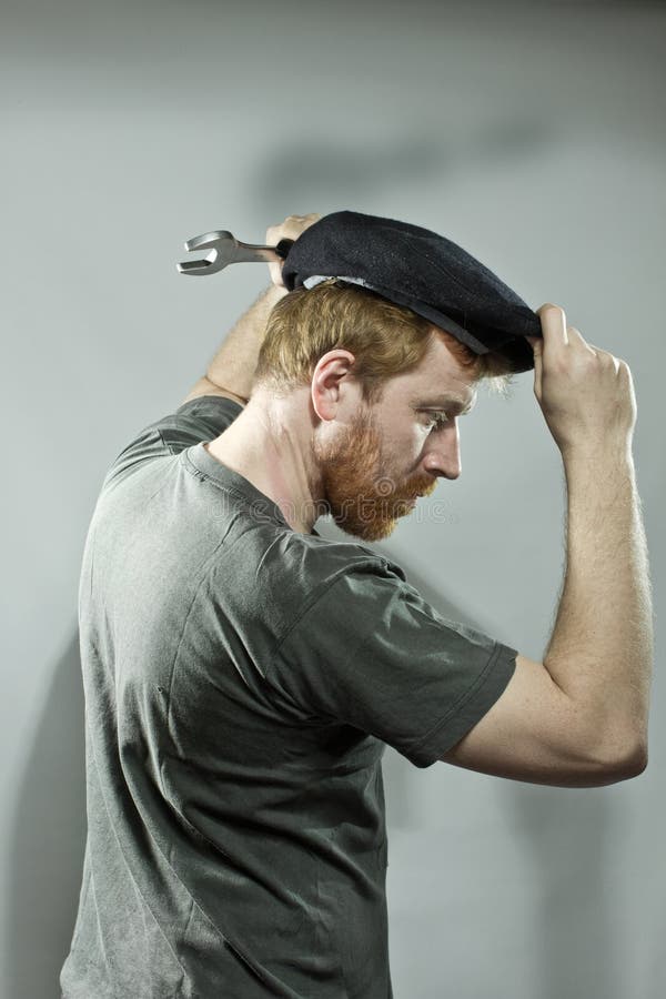 Plumber in Hat with Red Beard Stock Photo - Image of gesture, shaping ...