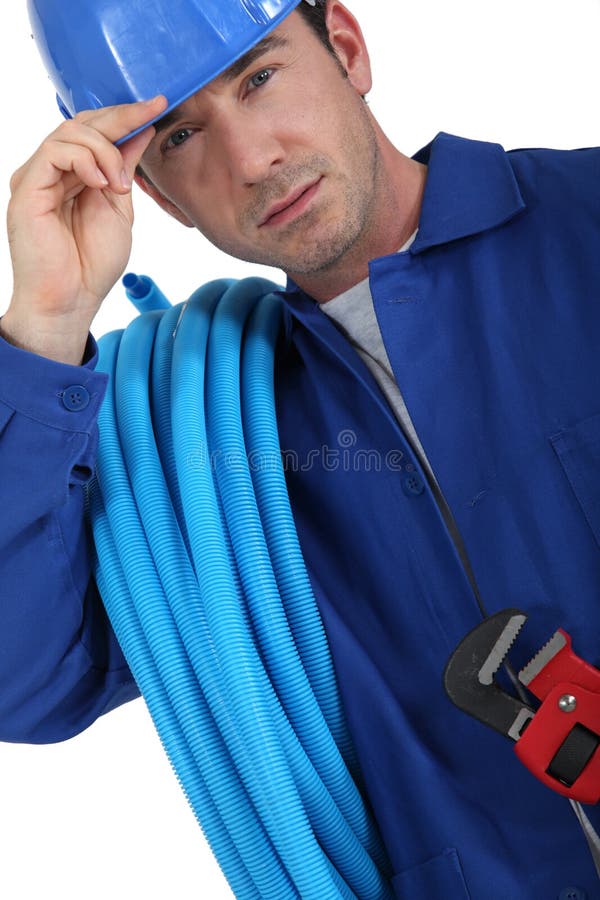 Plumber with helmet stock photo. Image of entrepreneur - 35906760