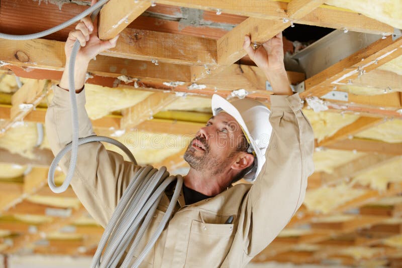 Plumber Holding Pipes Above Ceiling Stock Image - Image of installation ...