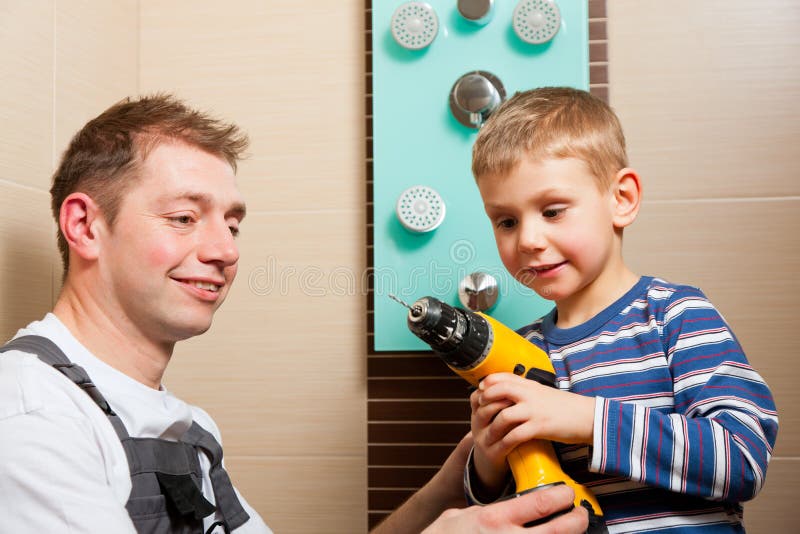 Plumber Installing a Mixer Tap in a Bathroom Stock Photo - Image of ...