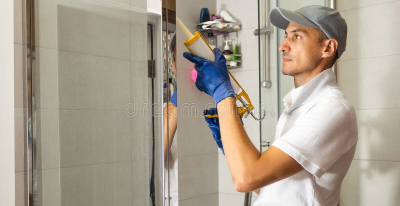 Plumber Installing a Shower Cabin in Bathroom Stock Image - Image of ...