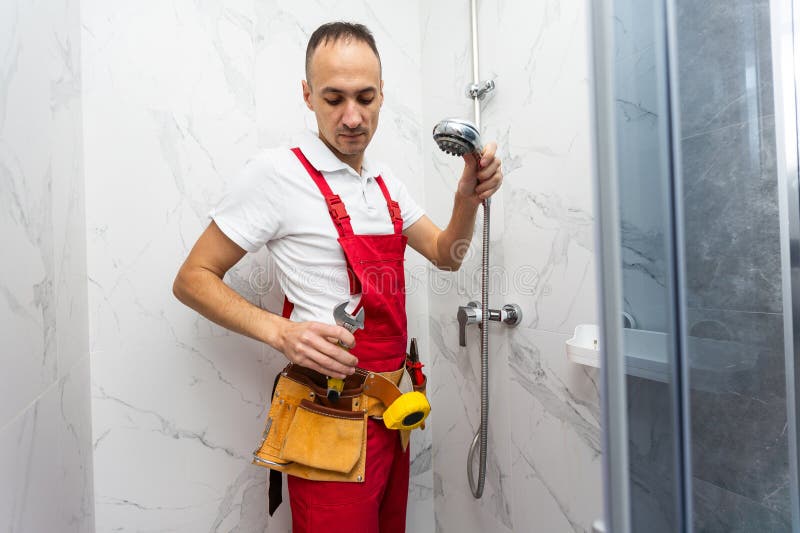 Plumber Installing a Shower Cabin in Bathroom Stock Image - Image of ...