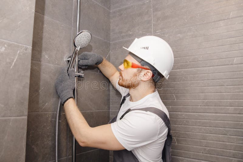 Plumber Installing Shower Stall, Work in Bathroom Stock Photo - Image ...