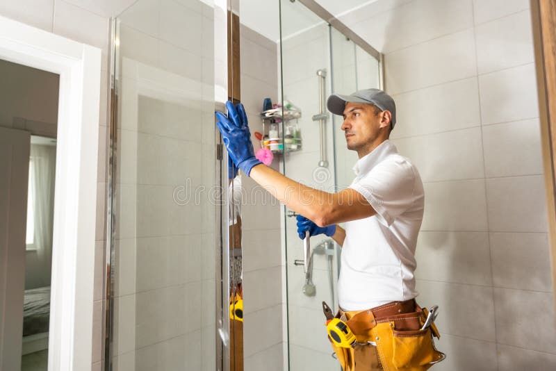 Plumber Installing Shower Stall, Work in Bathroom. Stock Image - Image ...