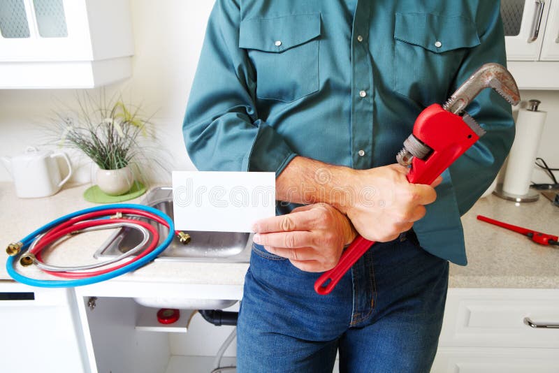 Plumber on the kitchen. stock photo. Image of copy, house - 48046040