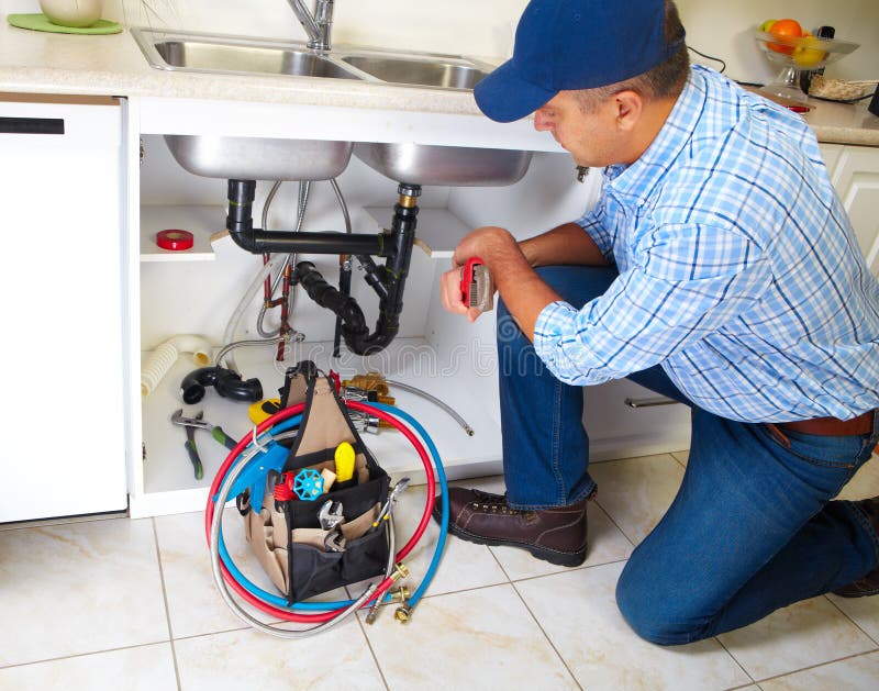 Plumber on the kitchen. stock photo. Image of human, renewal - 47973802