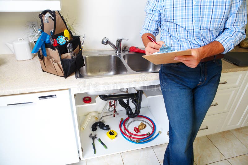 Plumber on the kitchen. stock photo. Image of human, renewal - 47973802