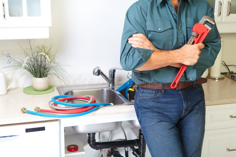 Plumber on the kitchen. stock image. Image of drain, handyman - 48046067