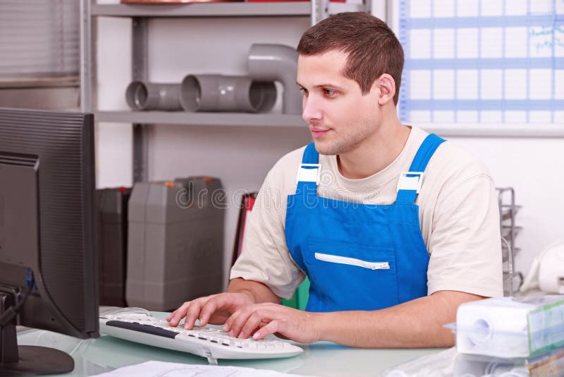 Plumber in an office stock photo. Image of builder, plumber - 35200764