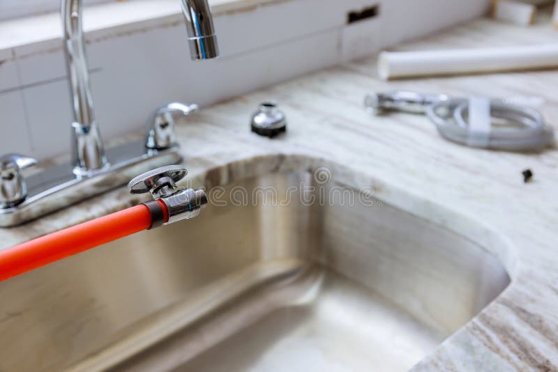Plumber in Pipe Connection Sink Installation of the Faucet of Kitchen ...