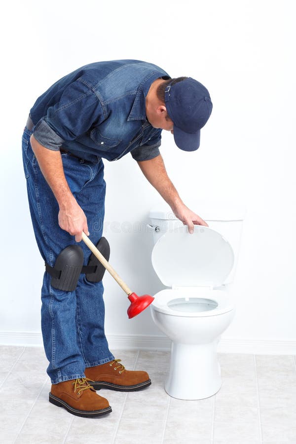 Plumber with a plunger stock photo. Image of installing - 17312956