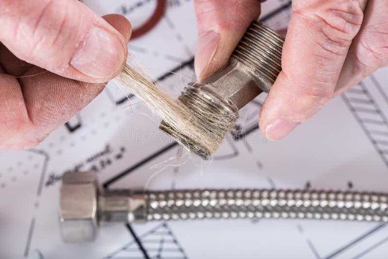 Plumber Putting Hemp Fibers on a Thread Stock Photo - Image of pressure ...