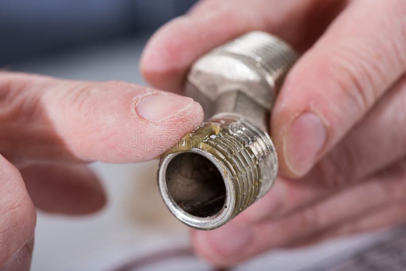 Plumber Putting Sealing Paste on a Thread Stock Image - Image of ...