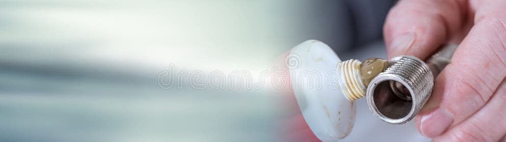 Plumber Putting Sealing Paste on a Thread. Panoramic Banner Stock Image ...