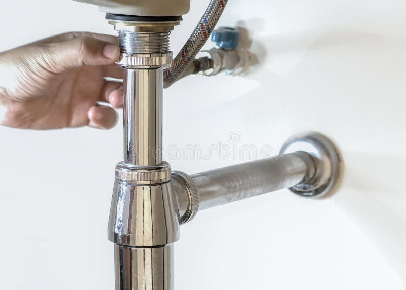 Plumber Solving the Problem of a Clogged Basin Stock Photo - Image of ...