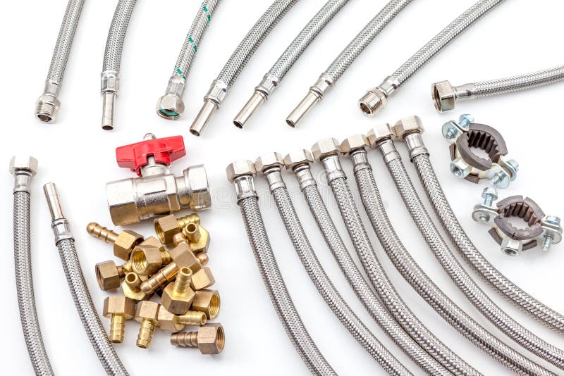 Plumbing Material and Smiling Plumber Behind in Industrial Warehouse ...