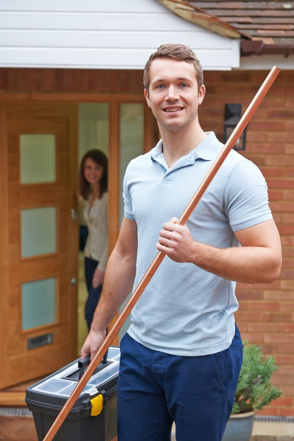 Plumber Standing Outside Client S House Stock Image - Image of female ...