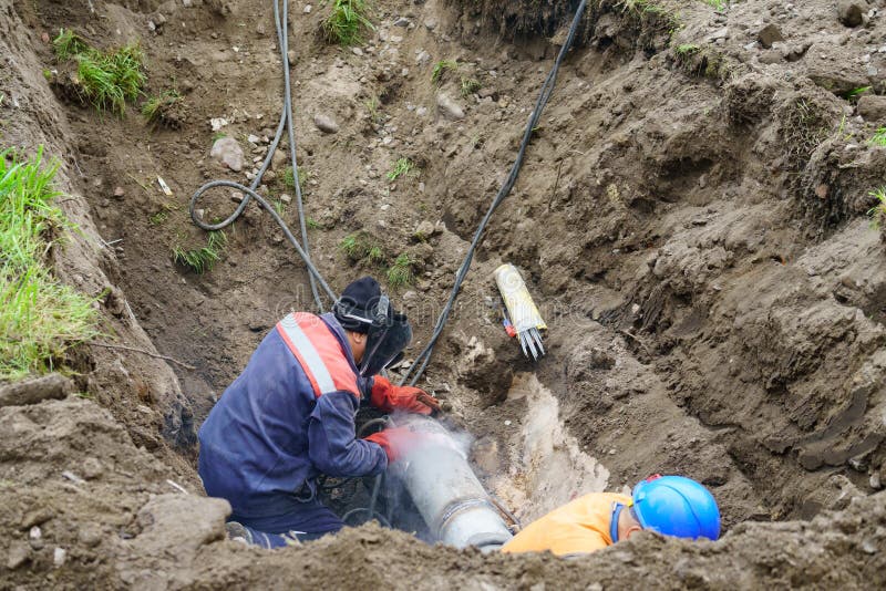 Utility Worker Fixing Broken Water Main. Sewerage Pipe Repair Concept. Stock Image - Image of ...