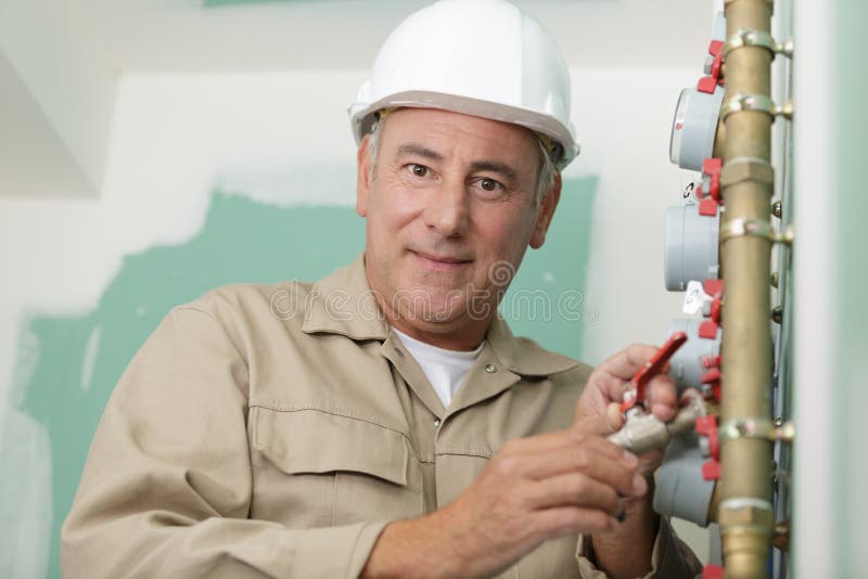 Plumber Technician Works with Water Meter Stock Image - Image of room ...