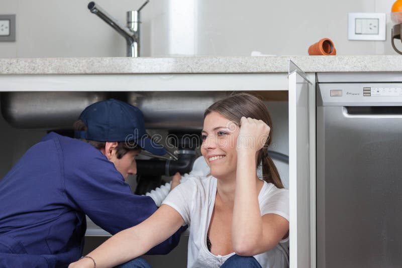 Plumber Thinking and Smiling Stock Photo - Image of business, plumber ...