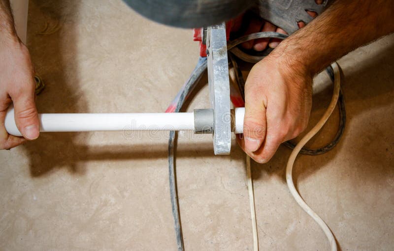 Plumber Weld Two Pieces of White Polypropylene Pipes Stock Photo ...