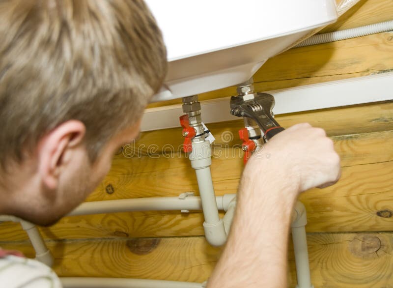 Plumber at work stock image. Image of caucasian, heat - 14163257