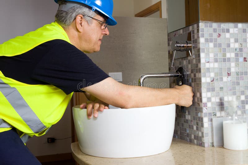 Plumber at work stock photo. Image of repair, male, brick - 29313644