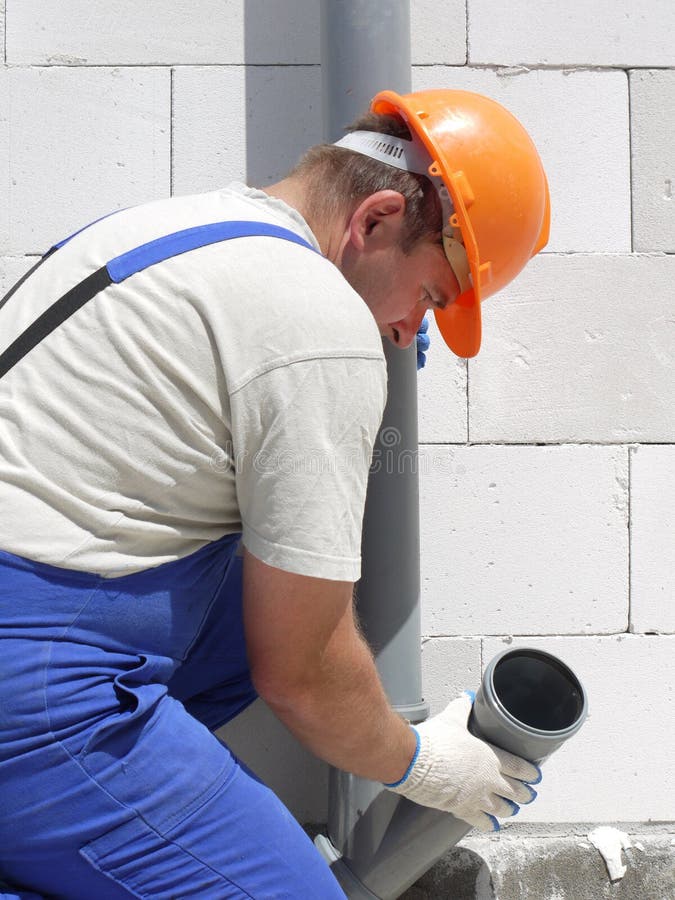 Plumber at work stock photo. Image of pipework, industry - 9822692