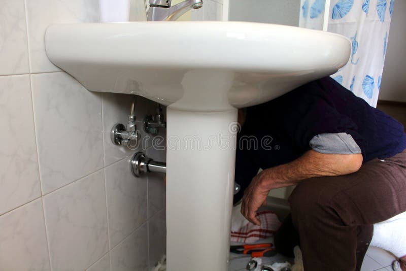 Plumber at work stock image. Image of fixing, sink, boiler - 50236953
