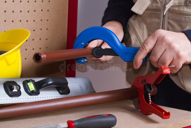 Plumber at Work in His Workshop Stock Photo - Image of remodel ...