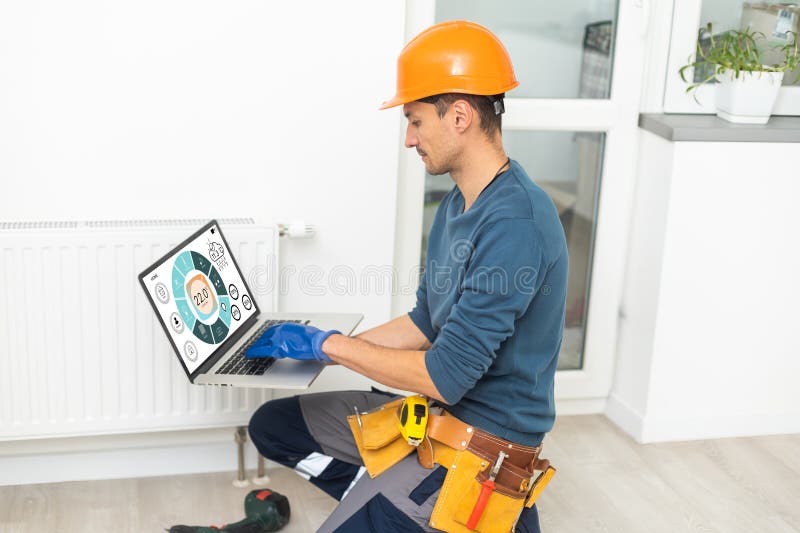 Plumber at Work. Installing Water Heating Radiator Stock Image - Image ...
