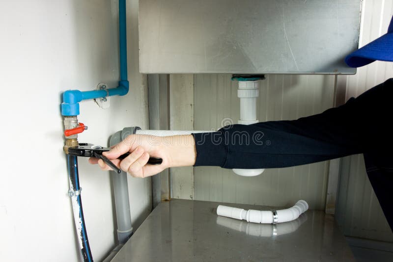 Plumber at work stock image. Image of plumber, professional - 33251619