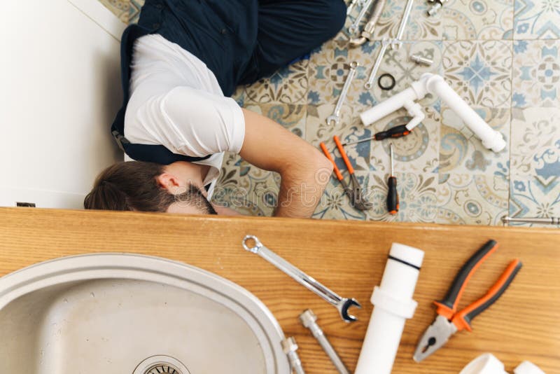 Plumber Work in Uniform Indoors Stock Image - Image of casual ...