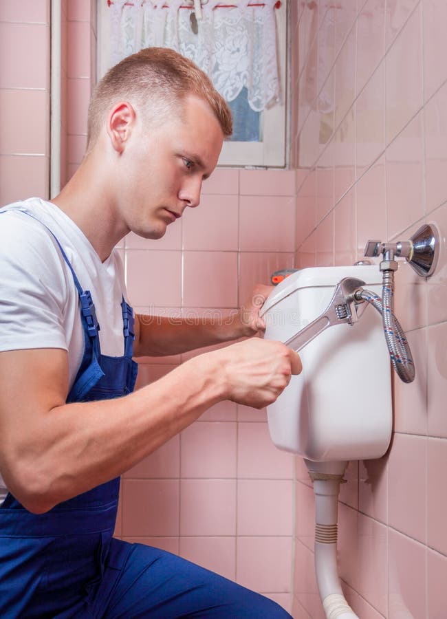 Plumber at work stock photo. Image of work, wearing, home - 5186062