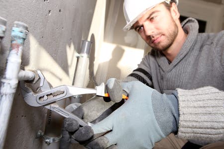 Plumber working stock photo. Image of caucasian, construction - 22184246